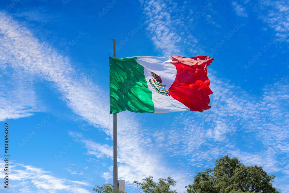 Los Cabos, Mexico, Mexican tricolor national striped flag proudly ...