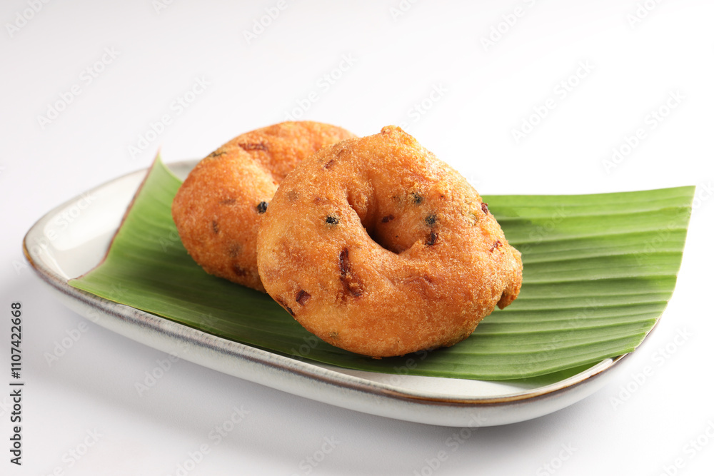 Medu wada or vada, a fried snack or Southindian breakfast made from ...