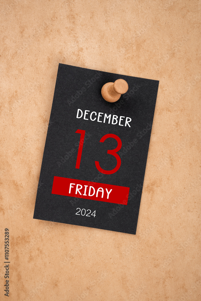 Calendar Friday the 13th December 2024 and wooden push pin on old paper ...