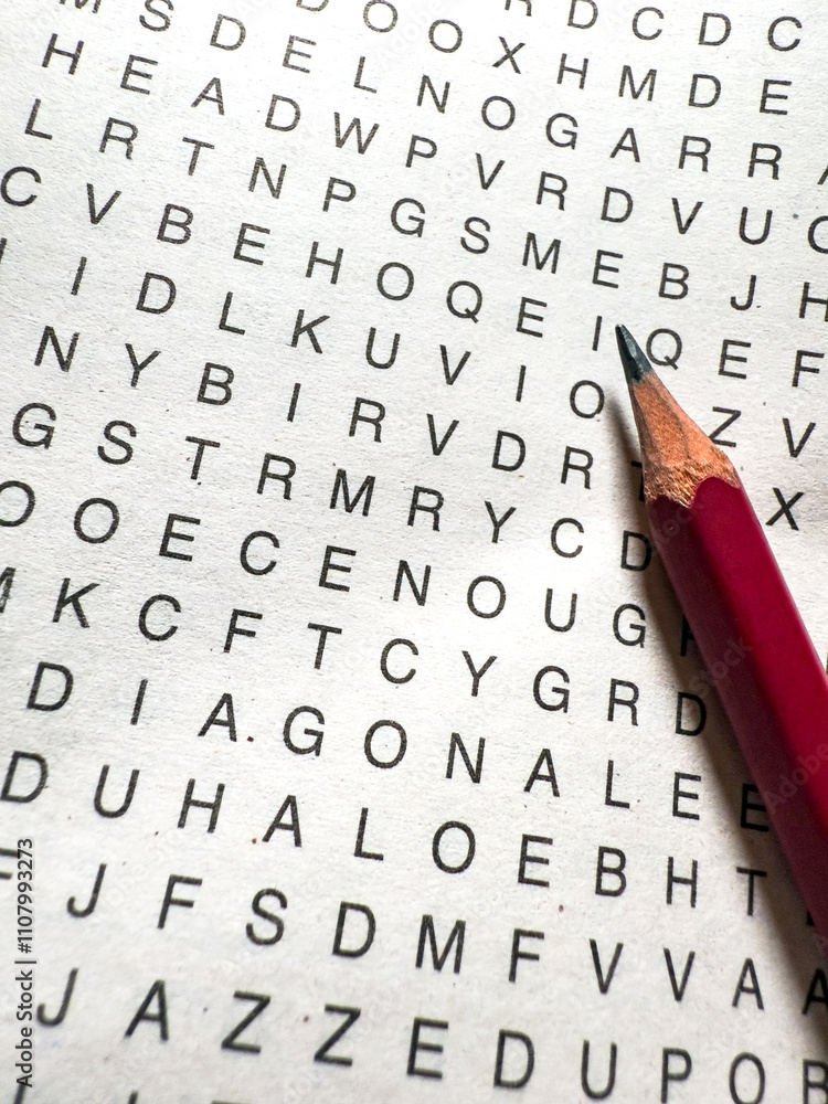 Word search puzzle with red pencil. Stock Photo | Adobe Stock