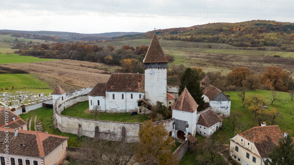 A stock photo of the Hosman Fortified Church in Romania captures the ...