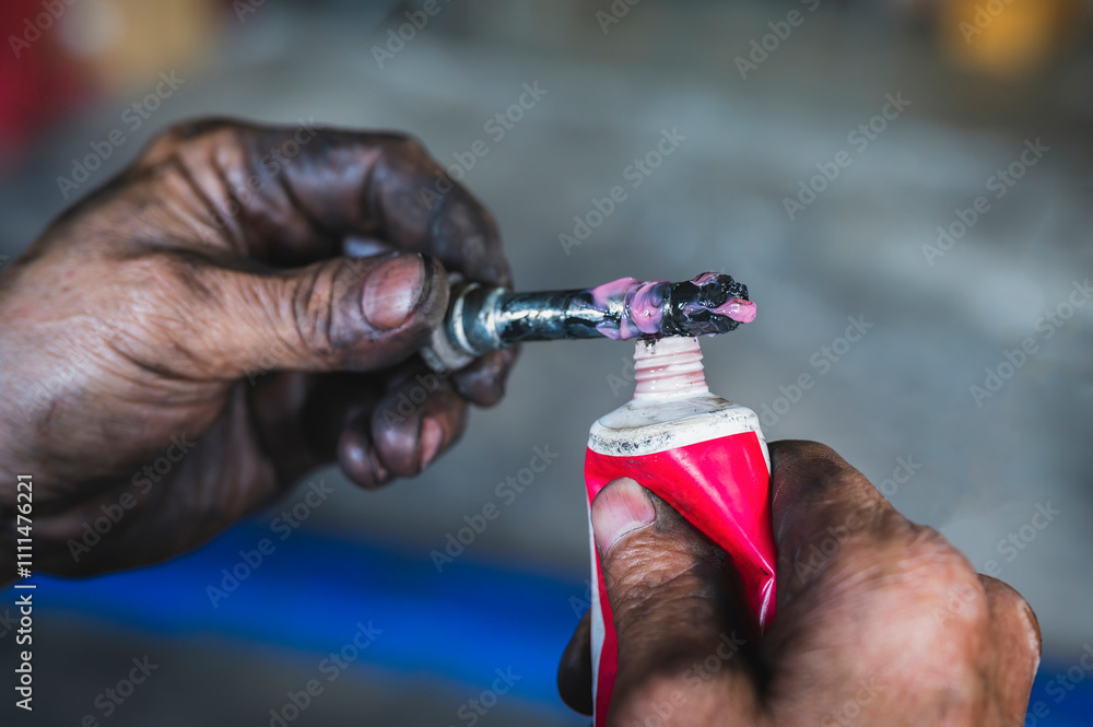 Auto mechanic check and lubricate brake caliper slider pins, car brake ...