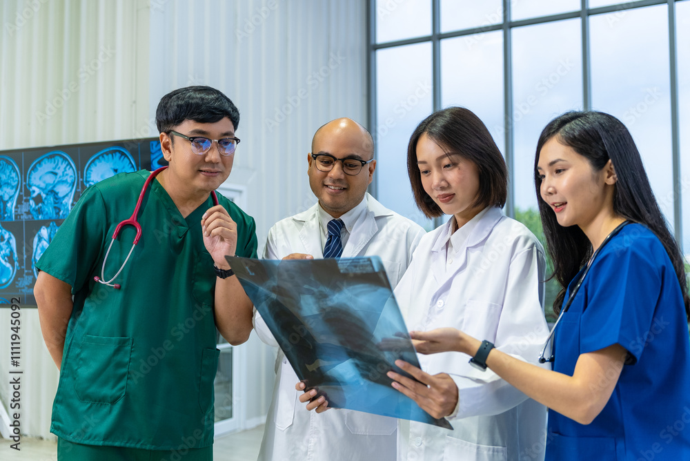 Group of professional doctors engaged in a discussion or meeting in a ...
