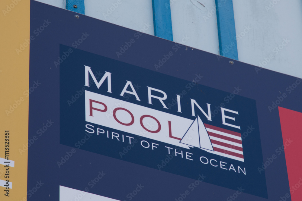 marine pool spirit of ocean brand logo and text sign of clothes facade ...