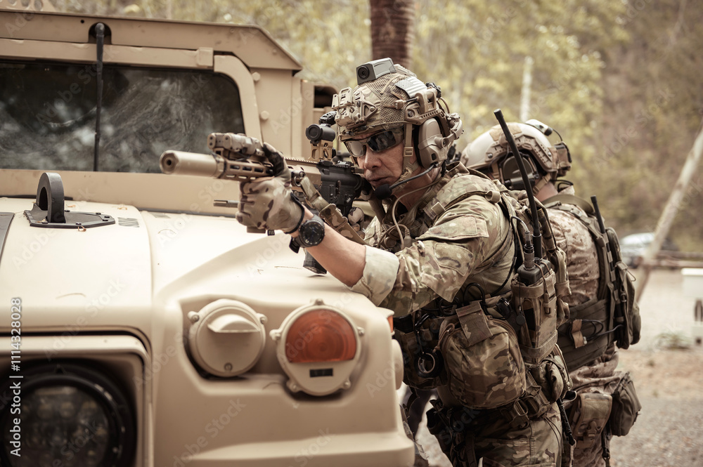 United States Army in camouflage uniforms operation in the forest.with ...