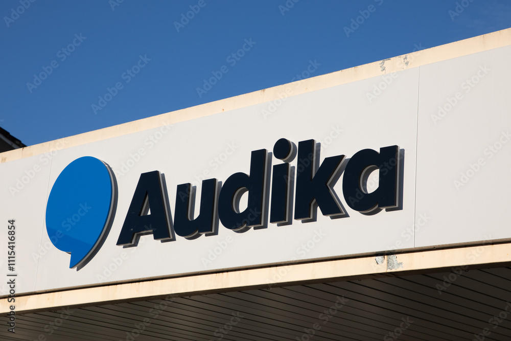 audika logo sign storefront and text brand front wall facade store ...