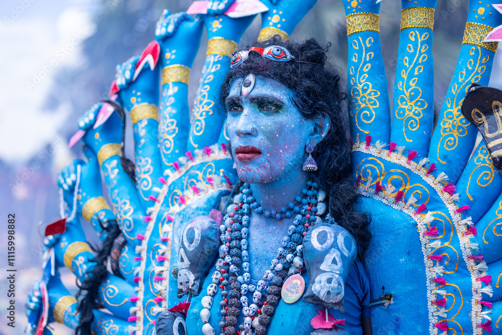 Kulasai Dasara, Portrait of indian male with painted face and dressed ...