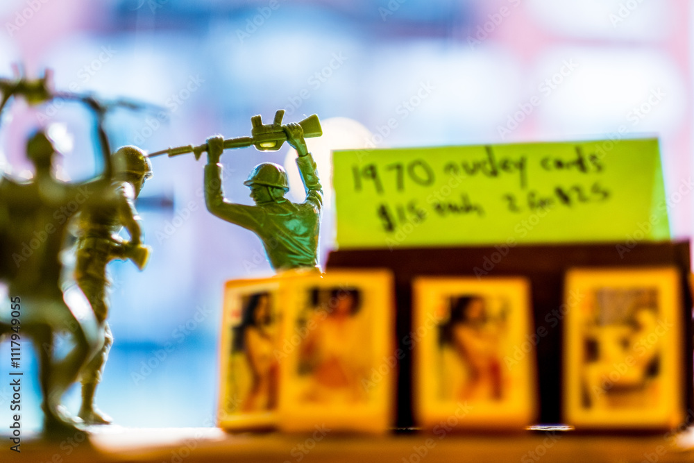 Vintage Toy Soldier Figurines Displayed with 1970s Trading Cards on a ...