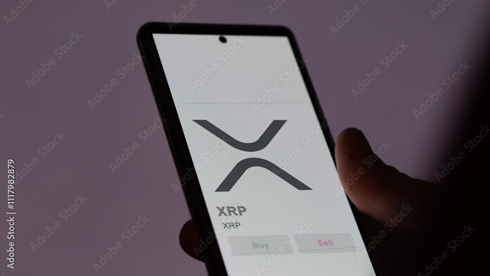 Photo Stock Close up on logo of XRP XRP on the screen of an exchange ...