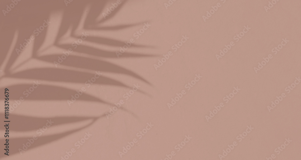 Shadow leaf dypsis on Mocha Mousse color wall. Mocha mousse color of ...