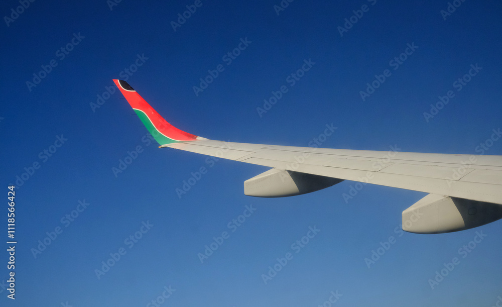Embraer E190 wing, Kenya Airways, in flight Stock Photo | Adobe Stock