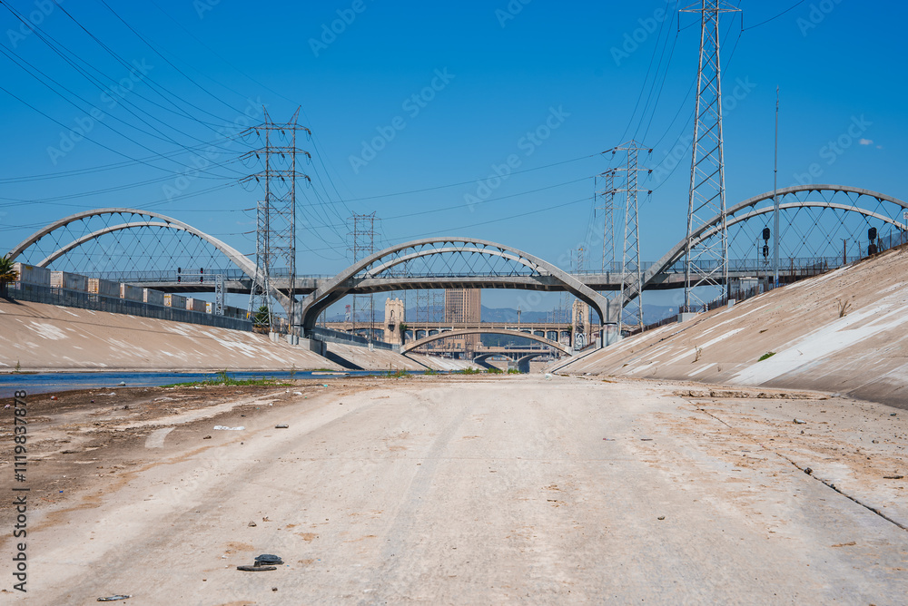 The iconic Los Angeles River features a concrete channel, arched ...