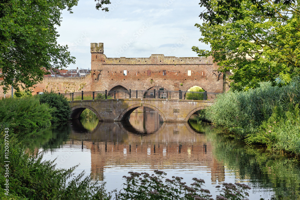 Berkelpoort, a 14th-century water gate in the city wall spanning the ...