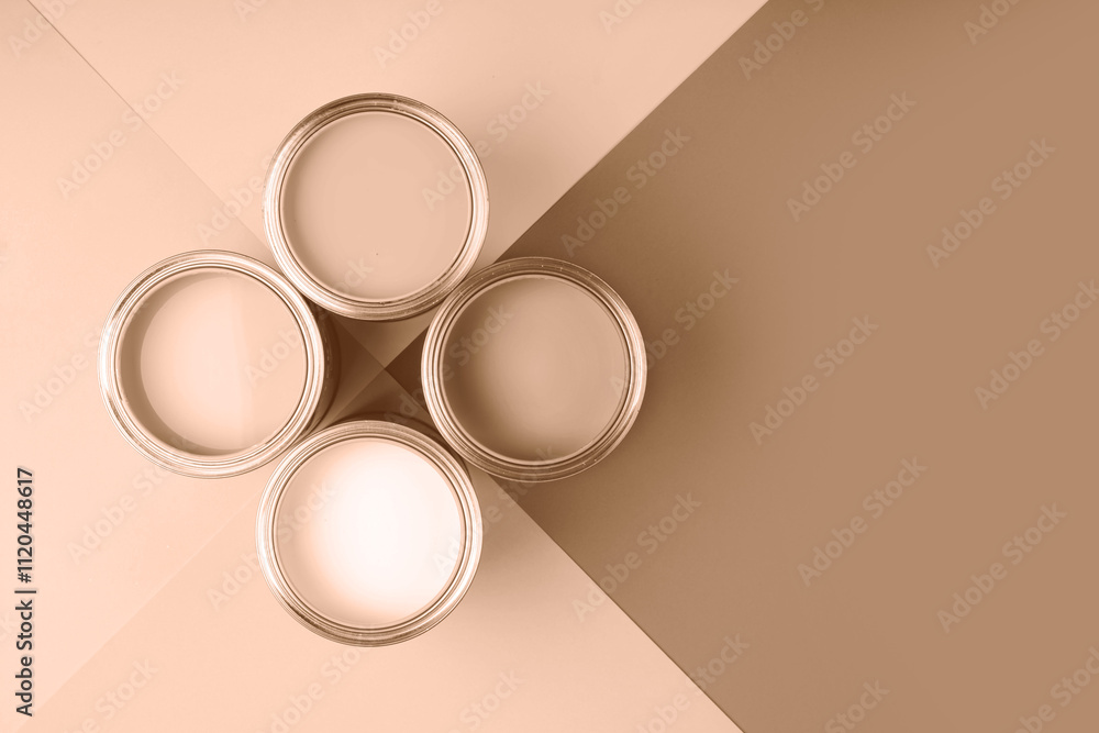 Four paint cans are displayed on a geometric background featuring beige ...