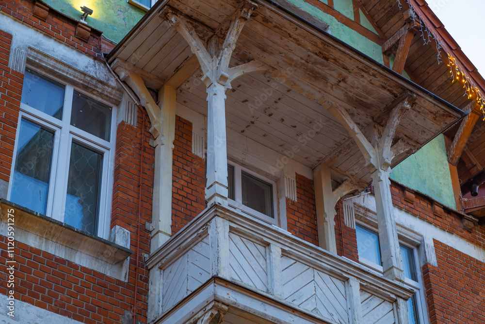 Historic Wooden Balcony on a Brick Building Highlighting Architectural ...