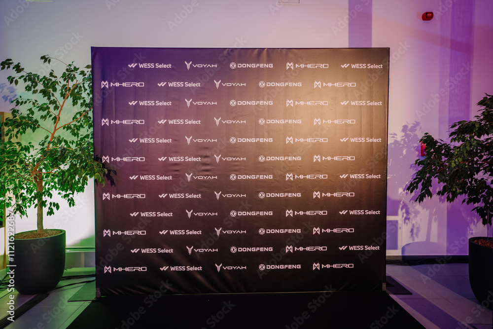 Dongfeng presentation backdrop featuring logos of M-Hero, Voyah, WESS ...
