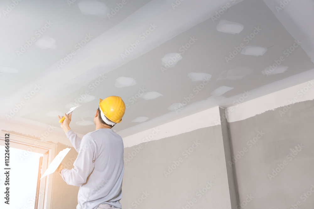 Craftsman working with plaster gypsum ceiling for interior build gypsum ...