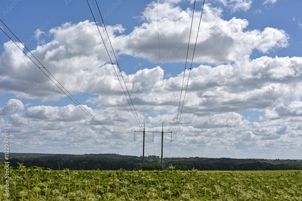 High voltage power line on blue sky background in Sunny day. wires ...