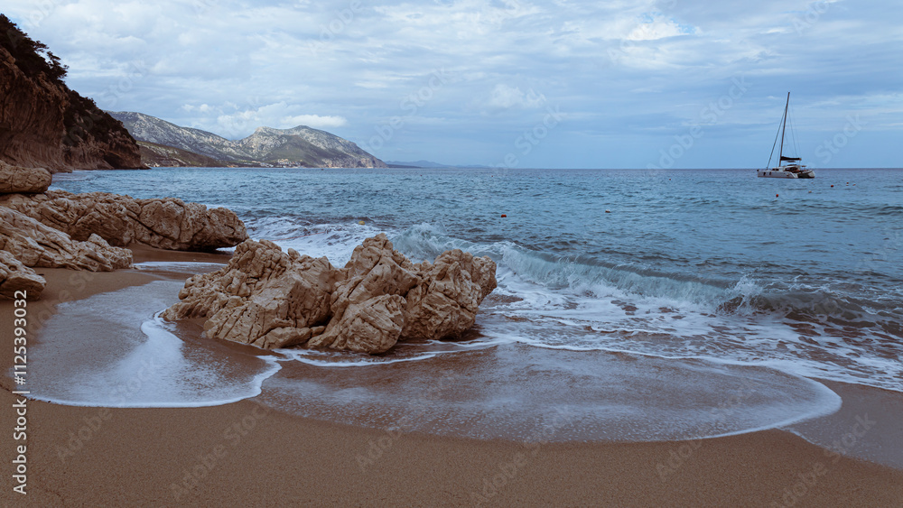 Turquoise wave and stone texture on the coast, Cala Luna, Mediterranean ...