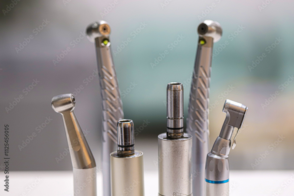 Dental hand instruments used in dental treatments. A rotary handpiece ...