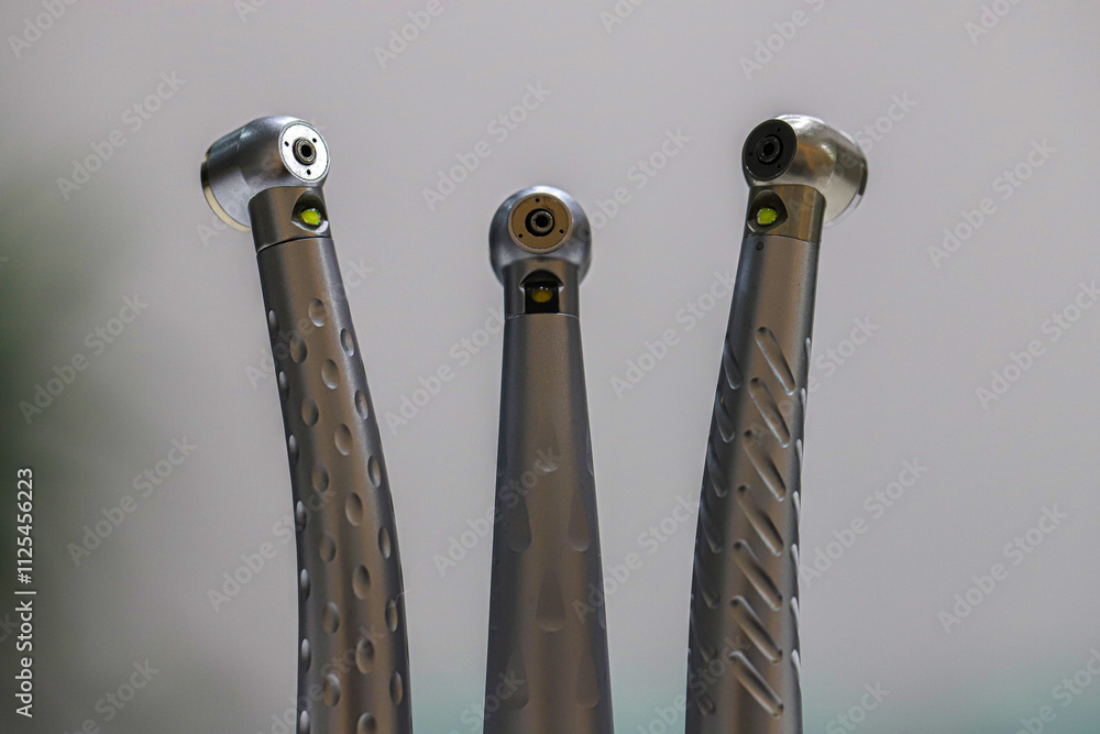 Dental hand instruments used in dental treatments. A rotary handpiece ...