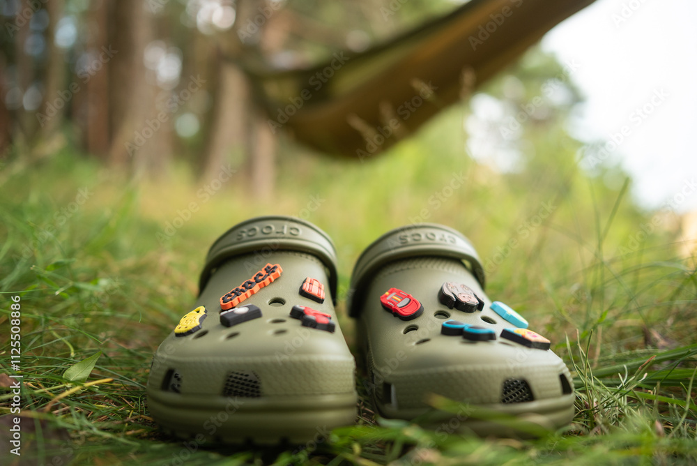 Warsaw, Poland - July 29, 2024: pair of green Crocs sneakers with the ...
