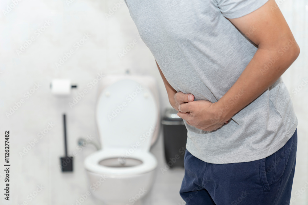Men have stomachache and use their hands to hold their stomach In the ...