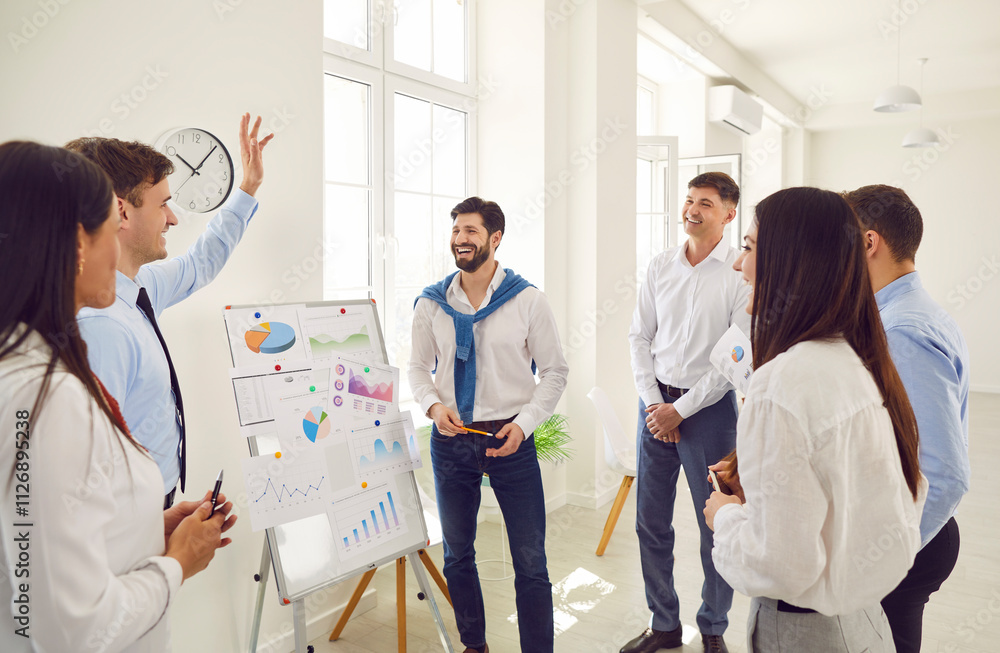 Successful business people on flip charts presentation of new project ...