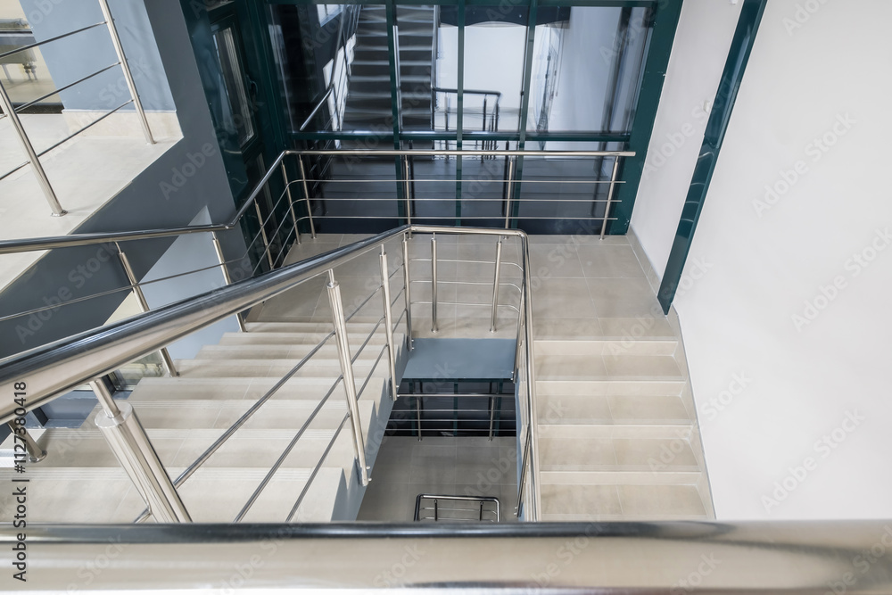 stairs emergency and evacuation exit stair in up ladder in a new office ...