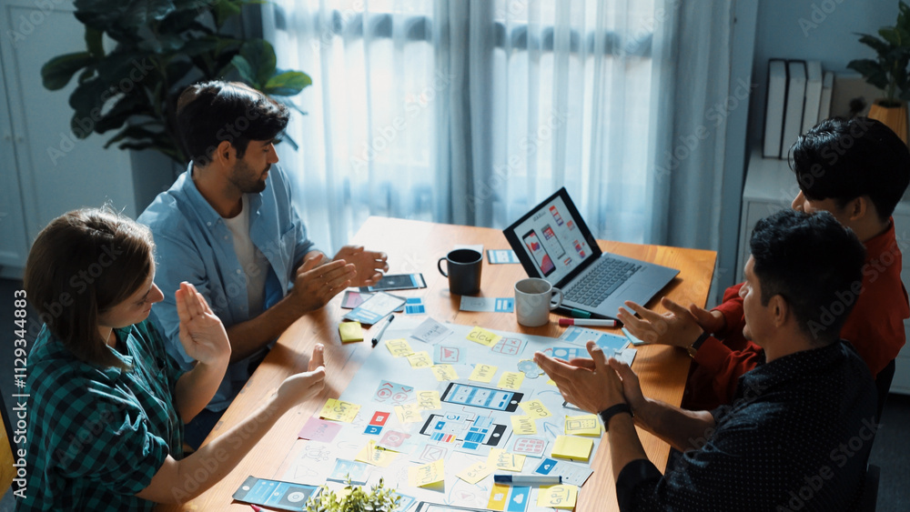Top view of business team brainstorming idea by using mind map while ...