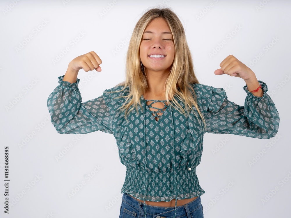 Strong powerful MODEL toothy smile, raises arms and shows biceps. Look ...