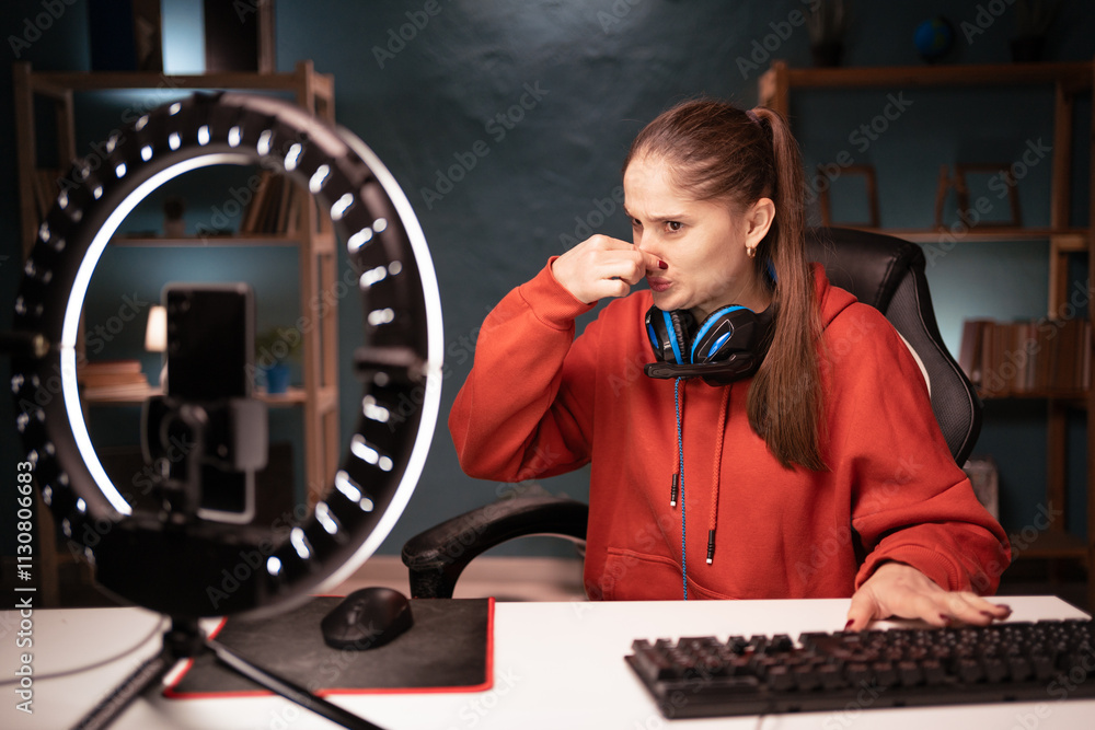 Woman gamer blogger influencer streaming live with her subscribers ...