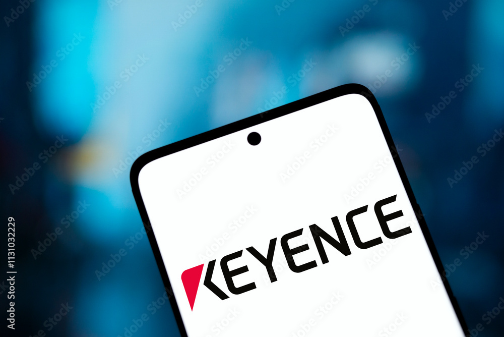 Dhaka, Bangladesh- 10 Dec 2024: Keyence logo is displayed on smartphone ...