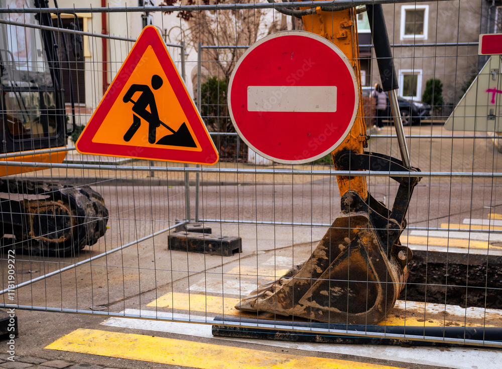 Construction Work in Progress With Warning Signs and Equipment on City ...