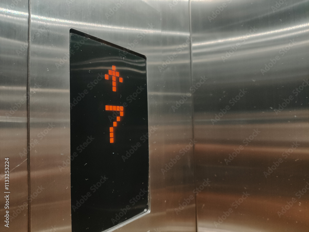 Digital numbers on the lift as indicators of office floor levels. Stock ...
