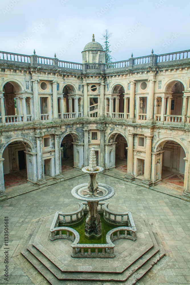 captivating aerial view of a historic monastery courtyard, revealing a ...