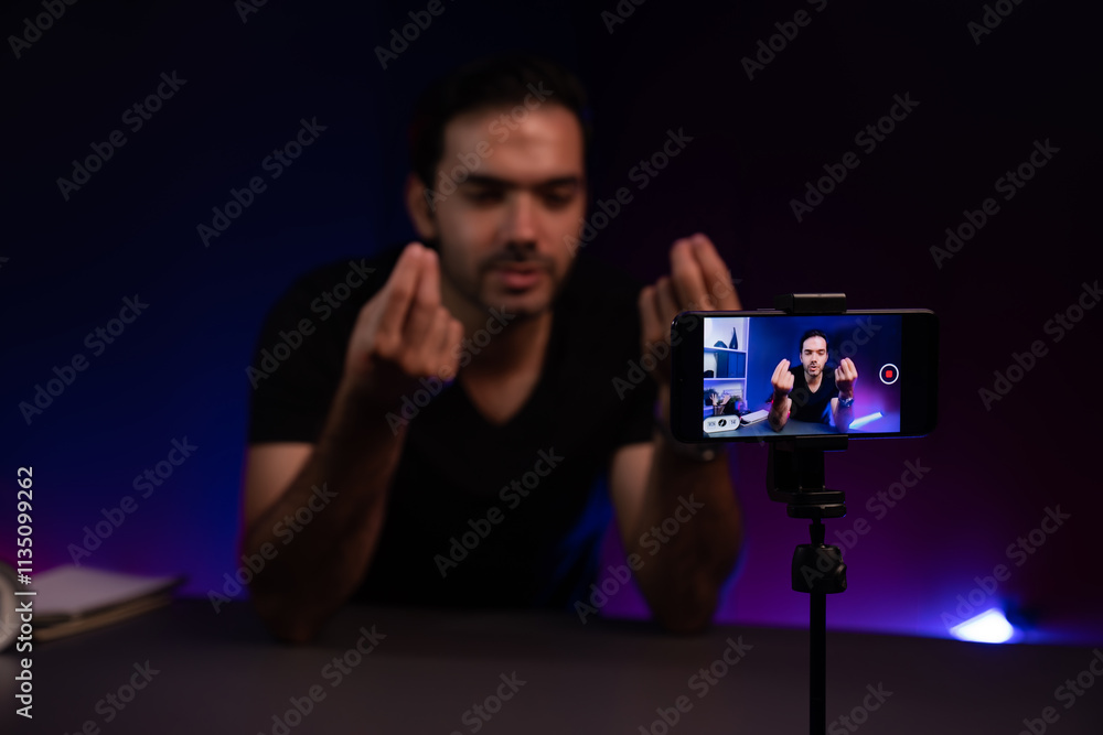 Broadcaster talking to listener on live streaming online with blurred ...