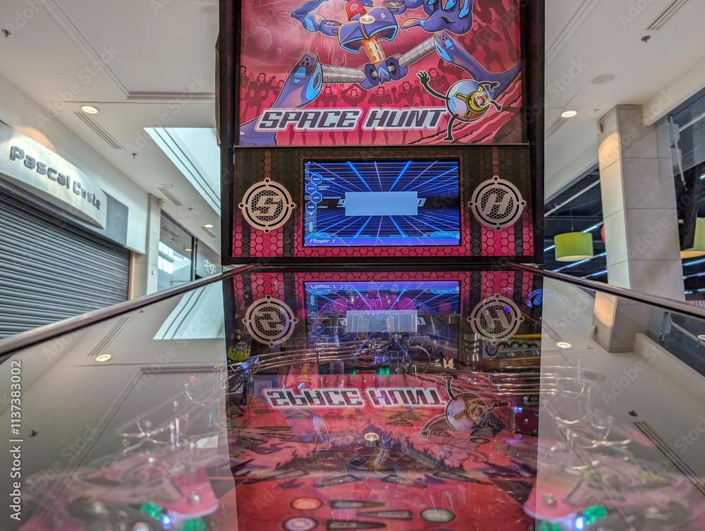 France, 21 October 2024 : Space-themed arcade game in an empty shopping ...