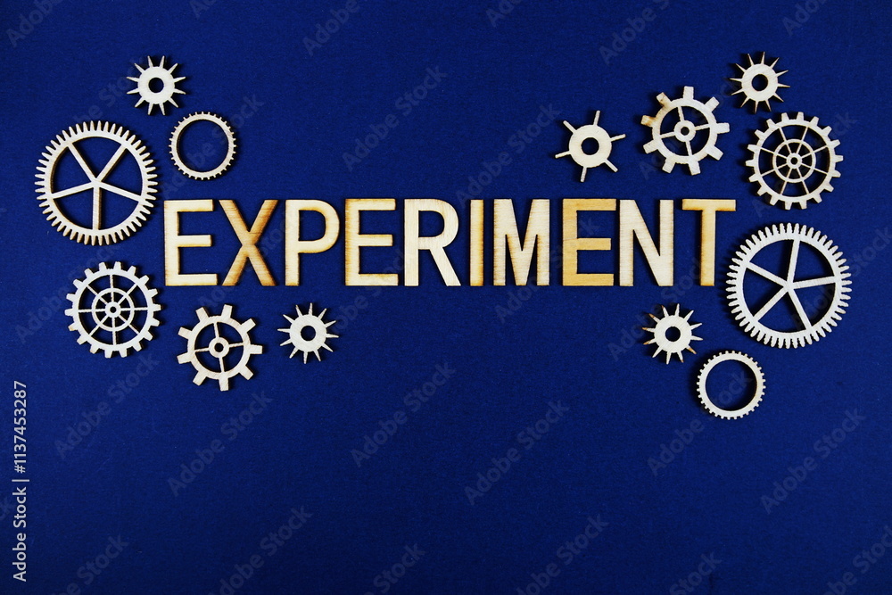 Experiment alphabet letters with gears element on navy blue background ...