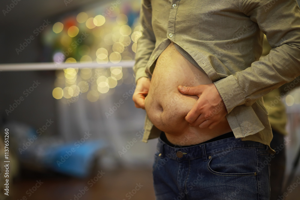 Man Examining Abdominal Fat Outdoors During Daytime: Health, Body ...