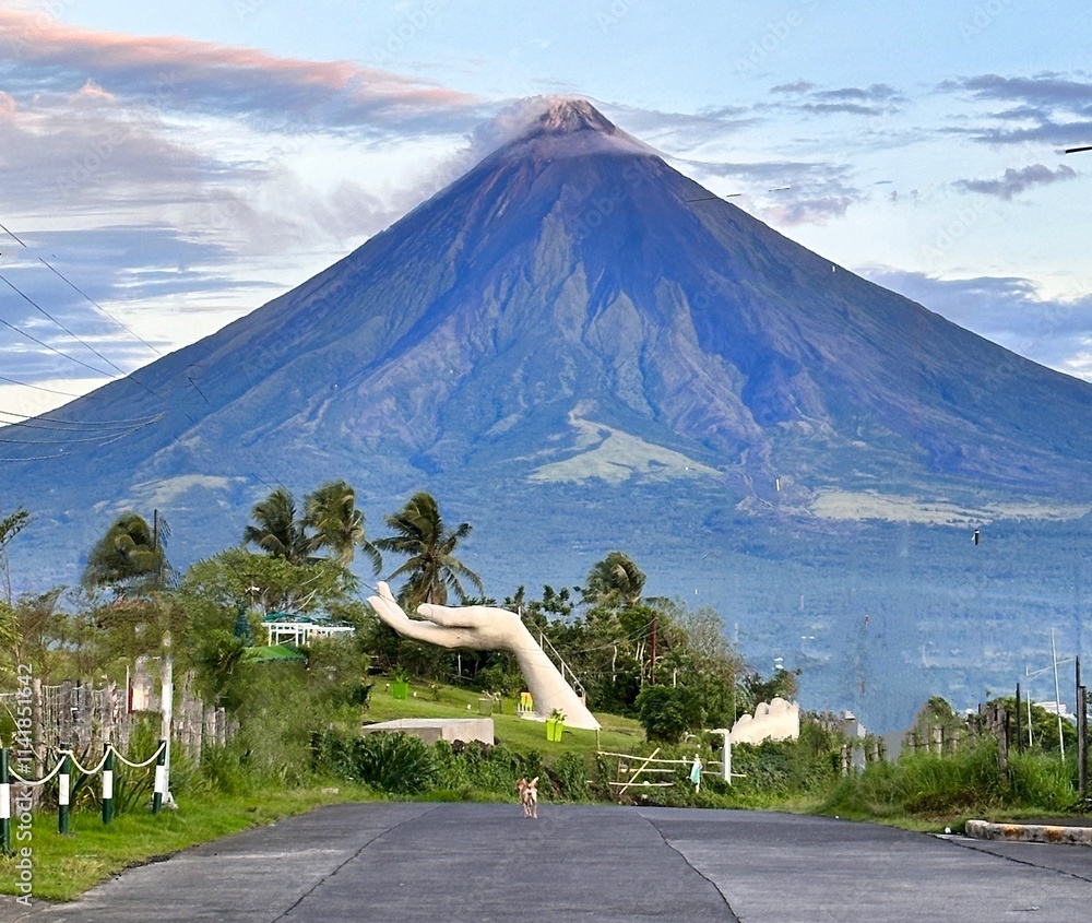Mayon Volcano in Highlands Park with big hands on front in Legazpi City ...