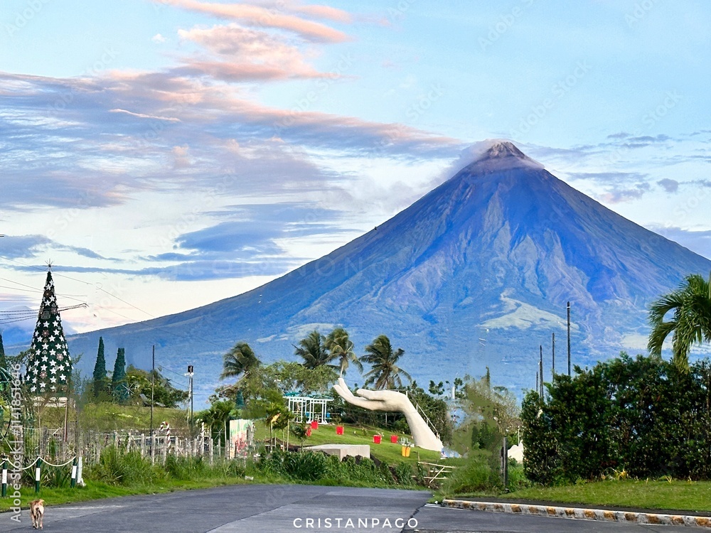 Mayon Volcano in Highlands Park with big hands on front in Legazpi City ...