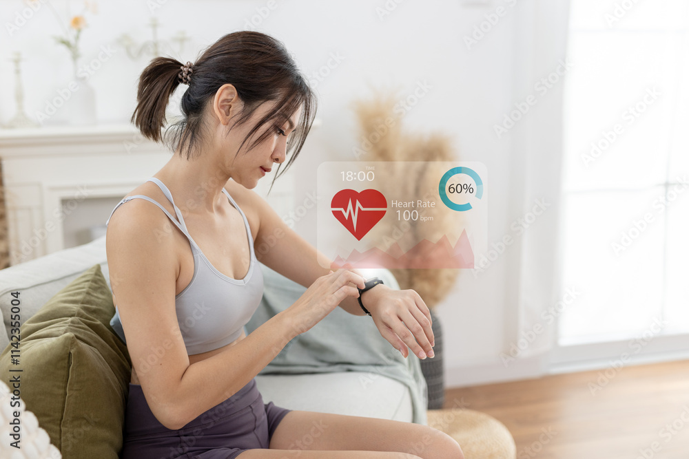 Women Point to smartwatch displaying heart rate application. Monitoring ...