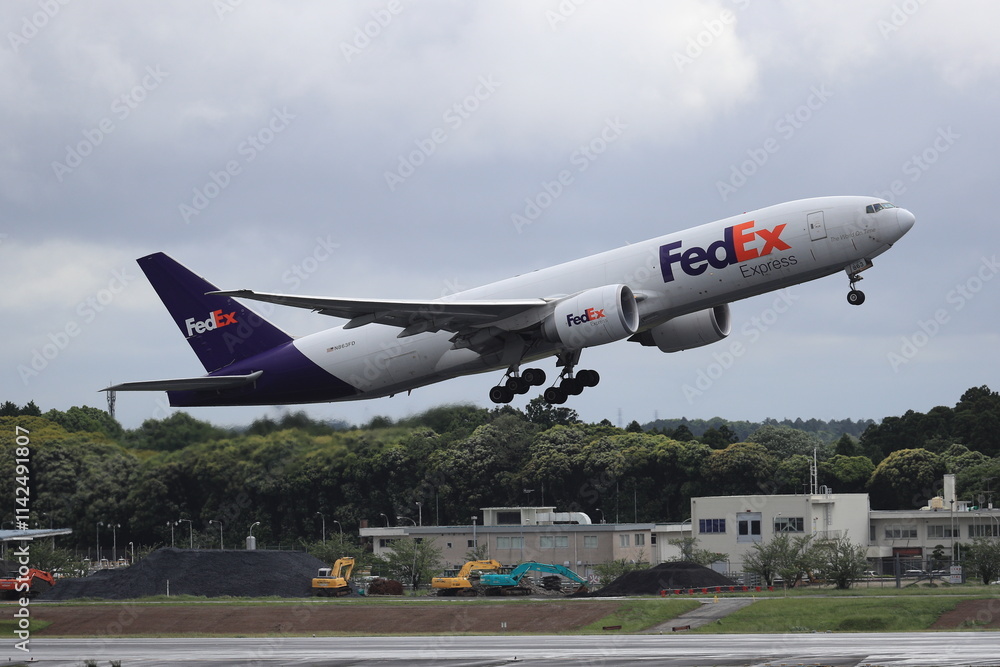 FedEx Express Boeing 777 airplane Narita airport Stock Photo | Adobe Stock