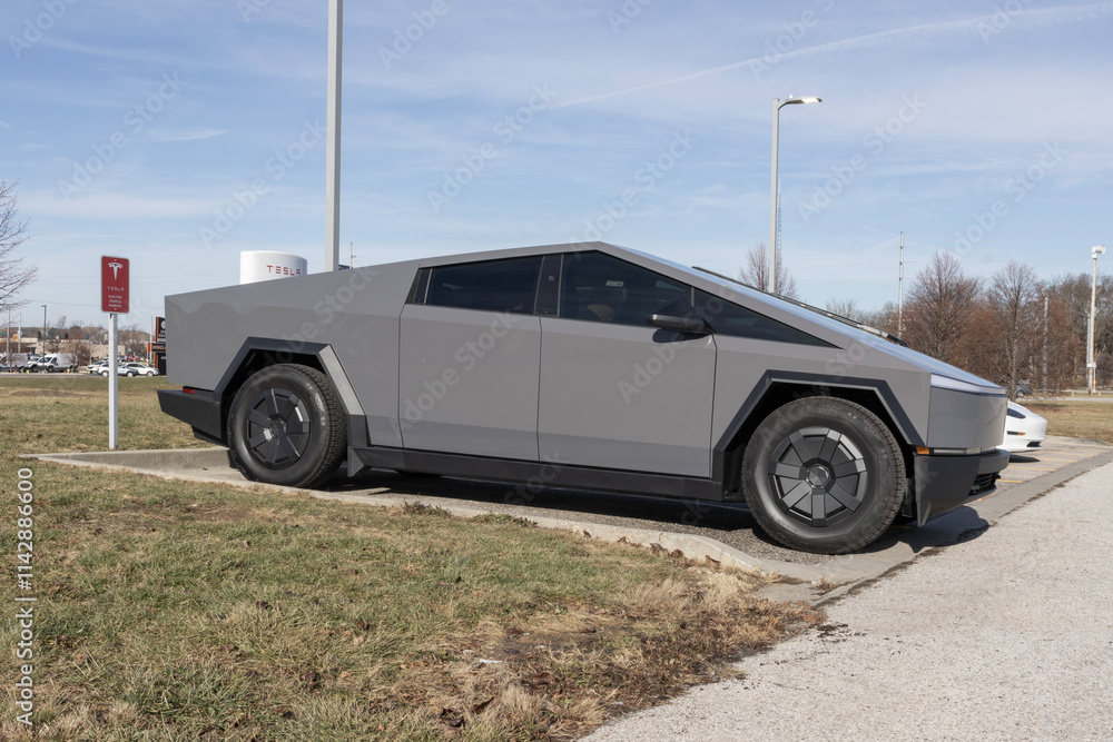 Tesla Cybertruck at a Supercharger. Tesla offers the Cybertruck with ...