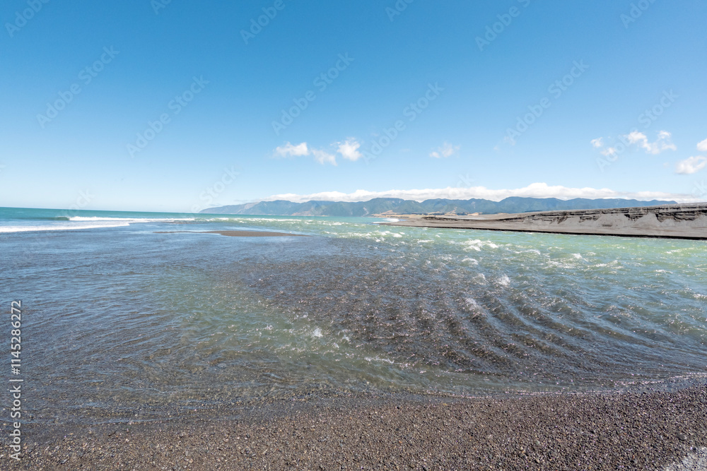 Pebble beach at Lake Ferry – Scenic Coastal Views of Palliser Bay and ...
