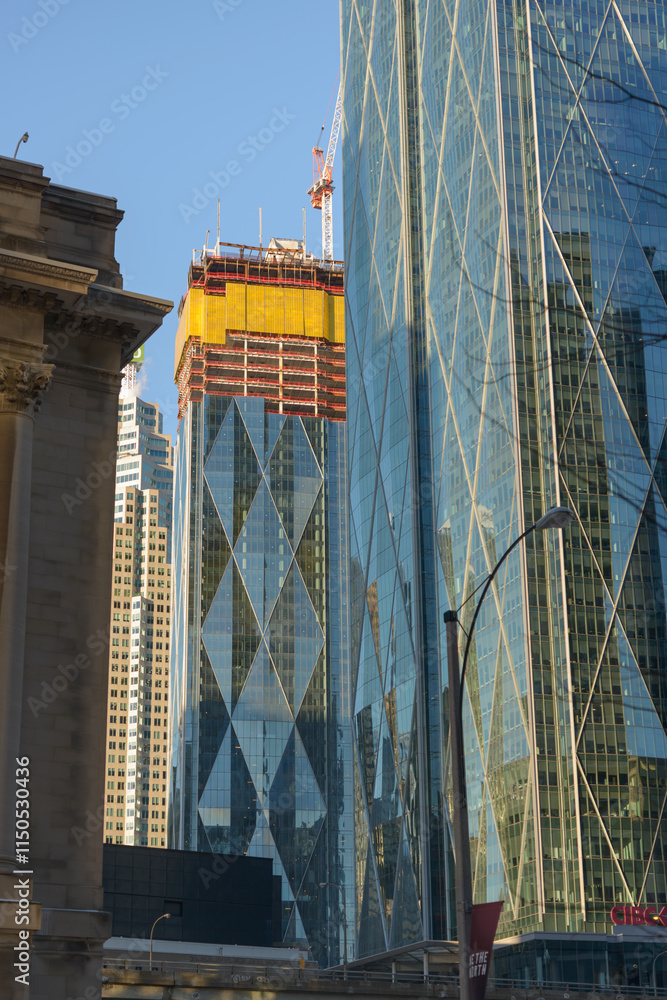 distant view of CIBC Square north towers still under construction in downtown Toronto, Canada ...