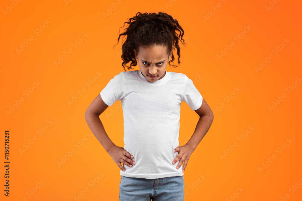 Grumpy Person. Serious furious black girl standing and putting hands on ...