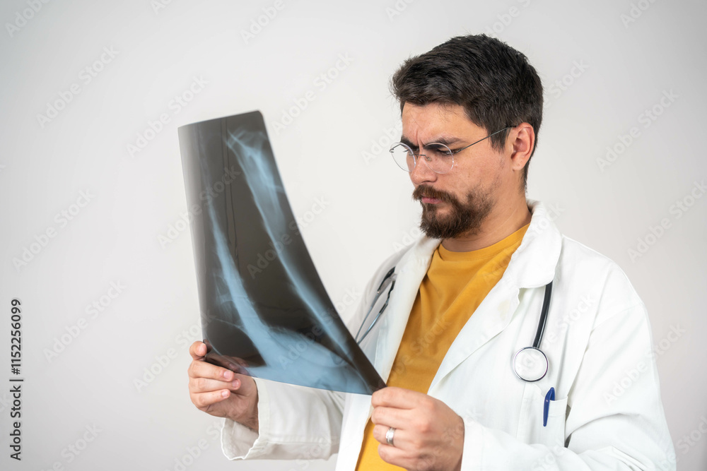 Male doctor examining the patient chest x-ray film lungs scan at ...