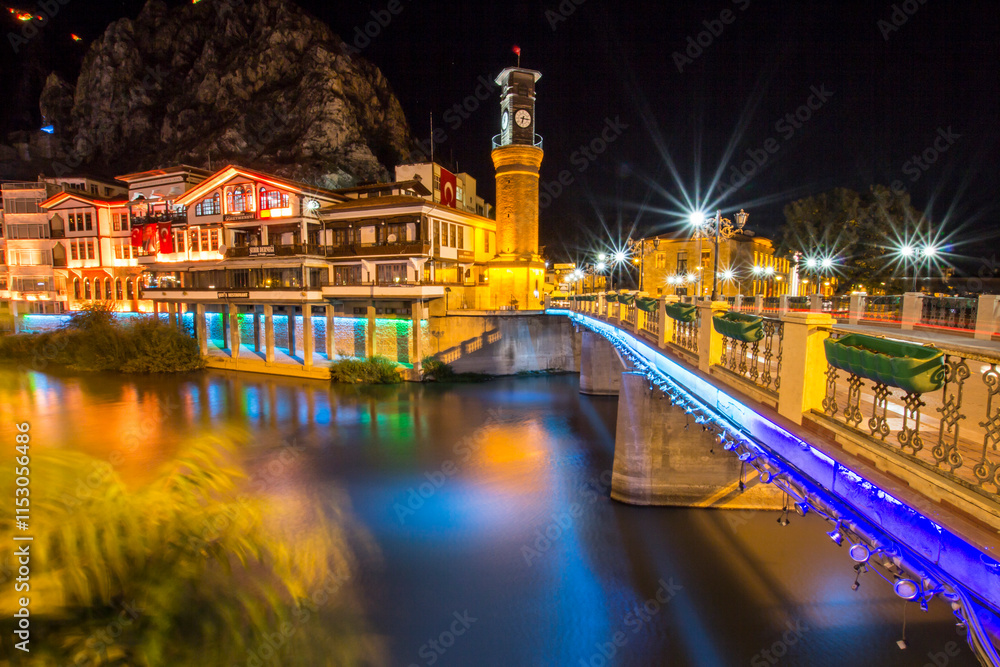 Old Ottoman houses and Clock Tower with night and mirrored view by the ...